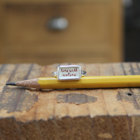 Sterling Silver and Enamel Runs With Wolves Ring - Script Hand Writing ...